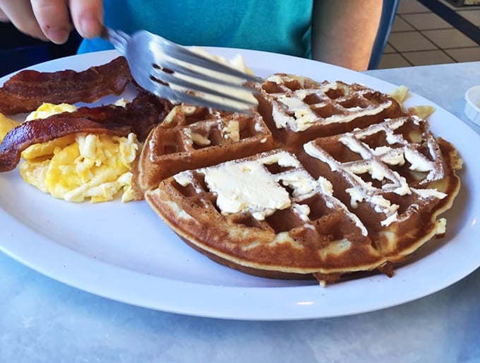 Waffle perfection meets breakfast bliss! This plate is proof that sometimes, the simplest pleasures are the most satisfying.