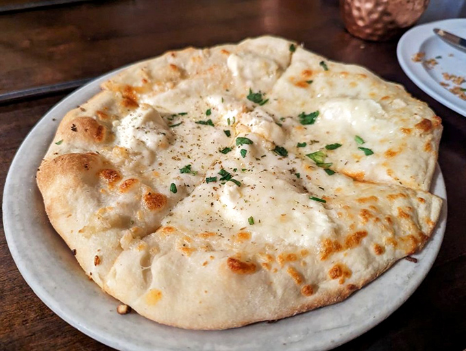 Who says you can't wear white after Labor Day? This pristine pizza proves that sometimes, less is more &ndash; and utterly delicious.