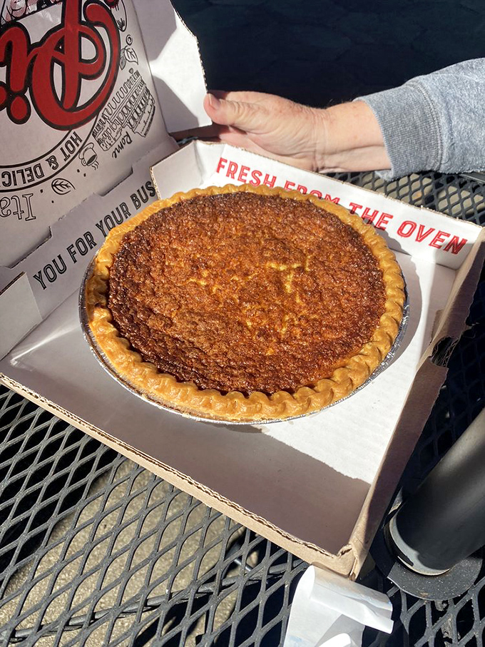 Fresh from the oven, this pie is hotter than Georgia asphalt in July. It's not just dessert, it's a religious experience.