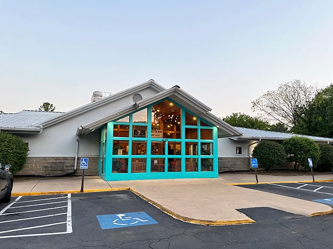 Catfish Hole: where comfort food gets a aquatic makeover. That turquoise trim is like a beacon for hungry souls!