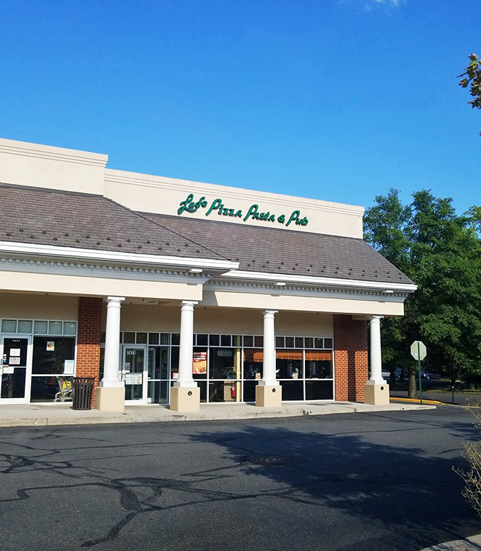 Ledo's clean, strip-mall simplicity is the Clark Kent disguise for the Superman of rectangular pizza experiences within.
