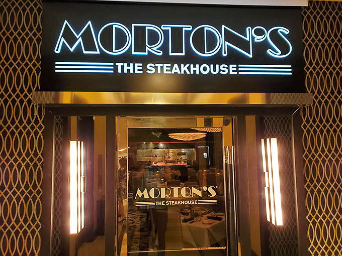 Morton's glowing entrance: Where steak dreams come true. It's like the pearly gates, if heaven were made of perfectly marbled beef.