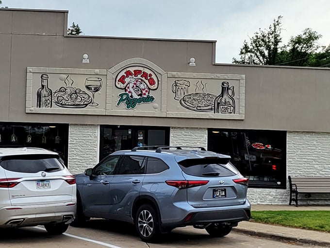  Papa's charming hand-painted sign announces its priorities clearly: pizza, pasta, beer. The holy trinity of comfort food.