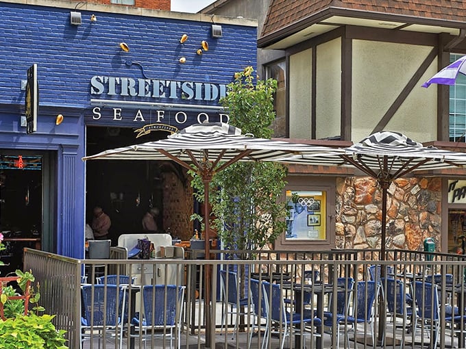 Blue exterior, striped umbrellas, and seafood that's been making waves since '95. It's like a European vacation in your backyard!