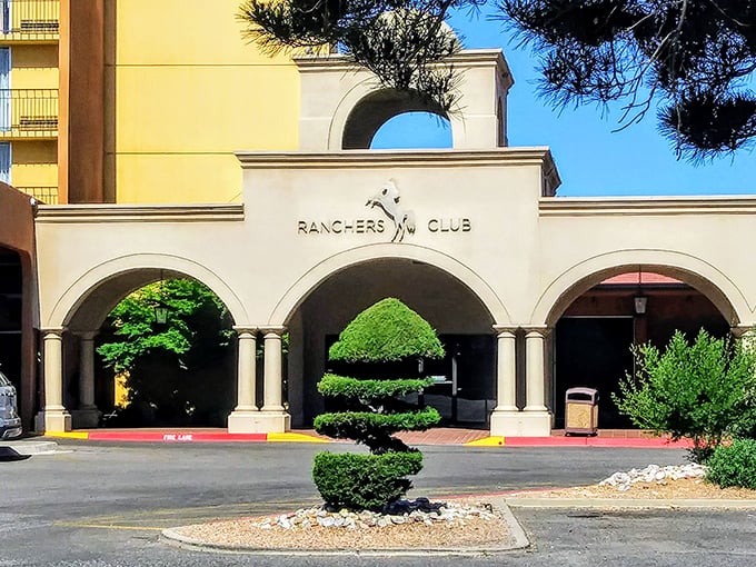 The Ranchers Club: Where cowboys meet luxury! This grand entrance says, "Leave your spurs at the door, but bring your appetite for adventure."