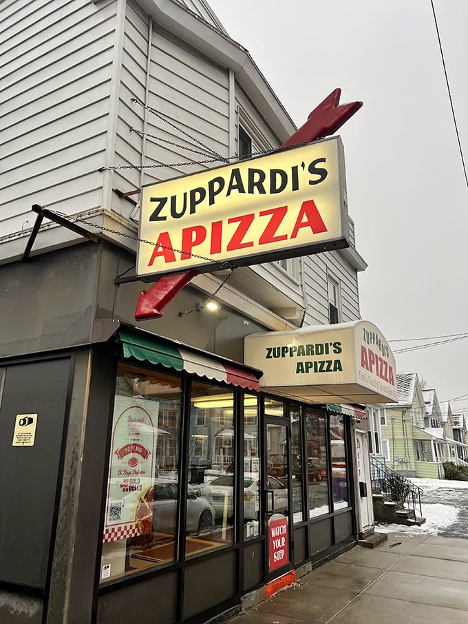 Zuppardi's Apizza: That classic red arrow points the way to pizza nirvana. It's like a time machine for your taste buds!