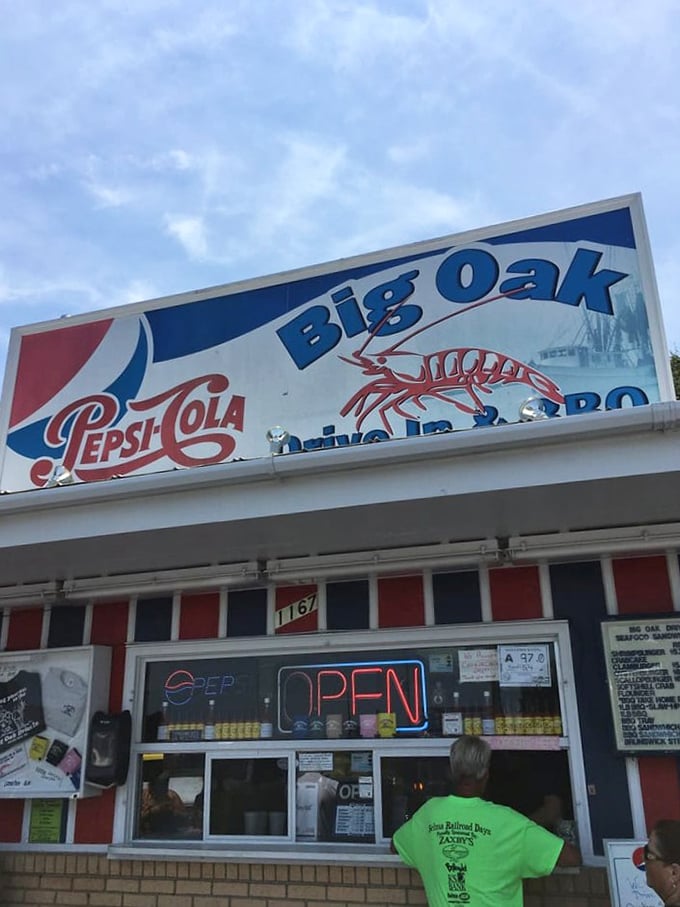 Surf meets turf at the drive-in! Big Oak's vibrant exterior hints at the flavor explosion waiting inside your car window.