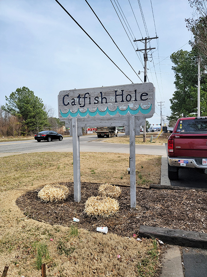 Step into seafood heaven! Catfish Hole's rustic charm will reel you in, but the aroma of fried catfish will make you stay.