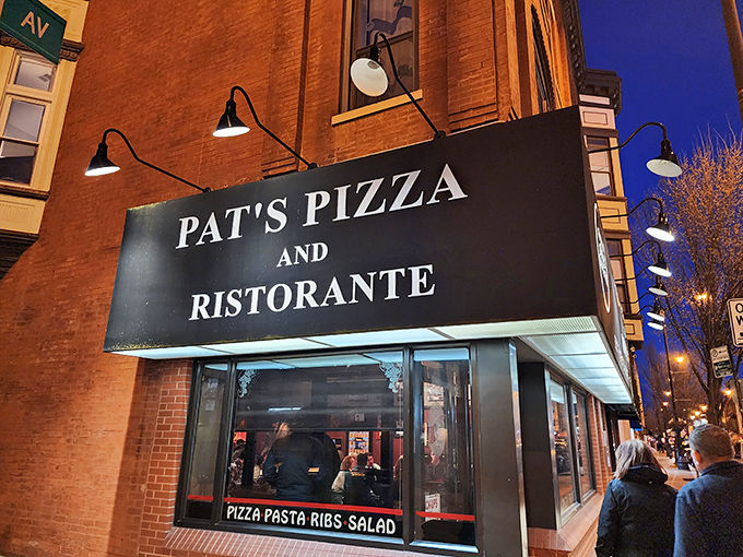 Pat's Pizza: Where the neon signs are bright, but the flavors are even brighter. It's like a slice of Old Chicago, served piping hot.