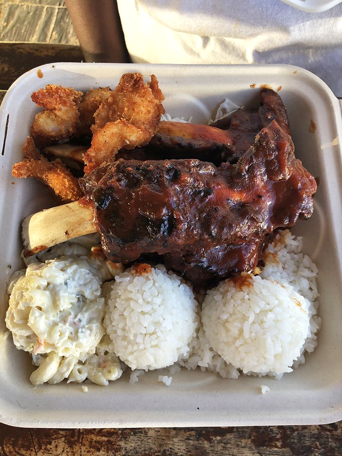 Holy smoke rings, Batman! These ribs are so tender, they practically melt in your mouth. Napkins are not optional.