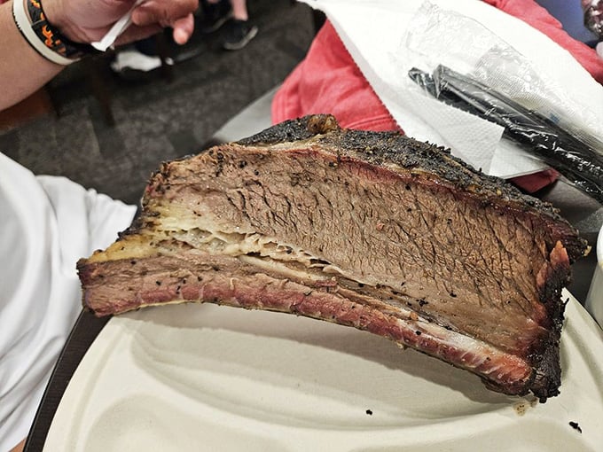 Jurassic Pork? Nope, just the mightiest beef ribs this side of the Mississippi, ready to make your taste buds roar with delight.