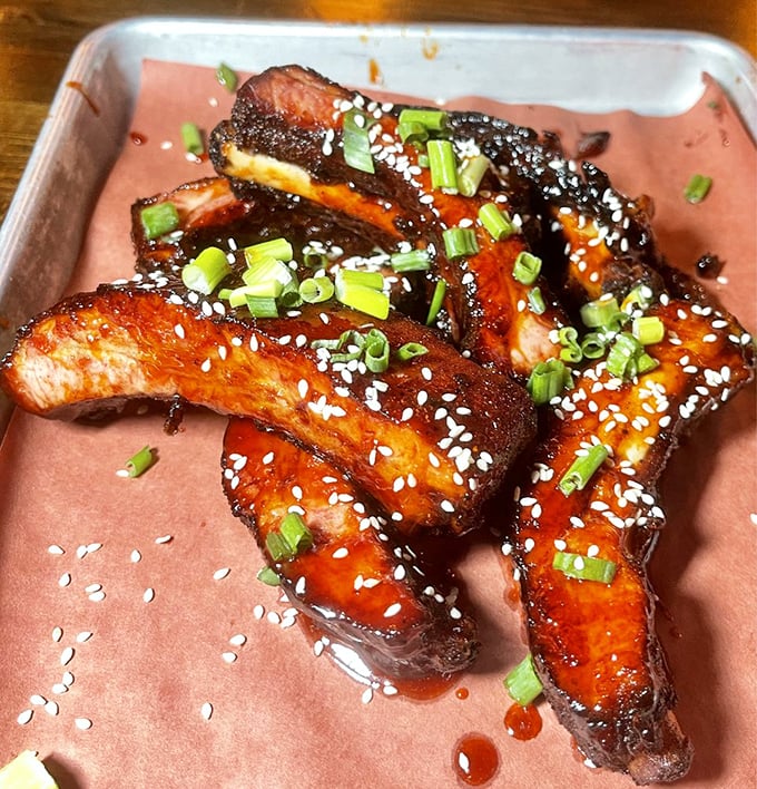 These ribs aren't just fall-off-the-bone good; they're write-home-to-mama, propose-marriage-to-your-plate delicious.