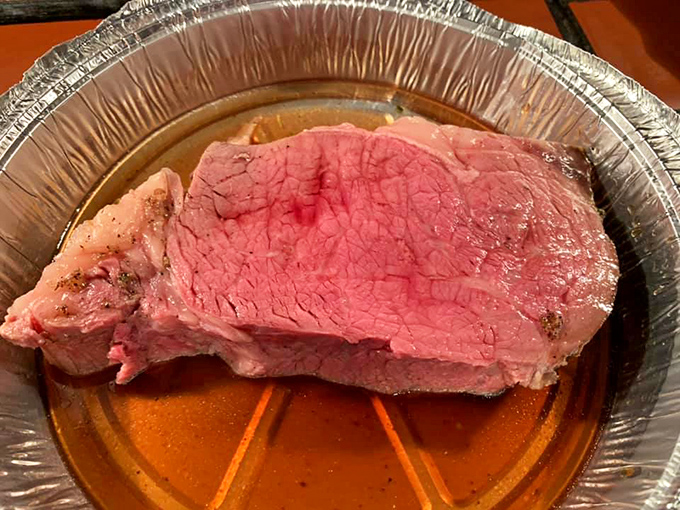 Bathed in its own juices and accompanied by horseradish that clears sinuses three counties away, this prime rib brings tears of joy.