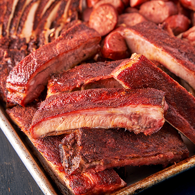 Move over, Flintstone-sized portions! These ribs are so massive, Fred and Barney would need doggy bags.