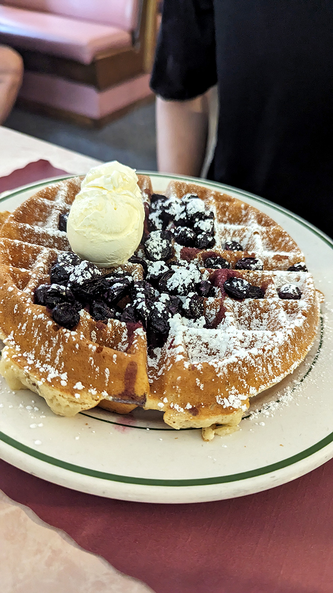 Behold the blueberry behemoth! This waffle is so loaded with fruity goodness, it could make Paul Bunyan's flapjacks look like silver dollar pancakes.