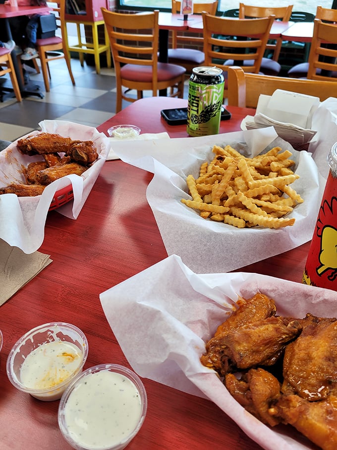 The dynamic duo of comfort food: crispy wings and golden fries. It's a match made in culinary heaven.
