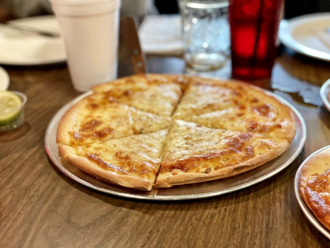 Cheese pizza perfection: where simplicity meets indulgence. It's the little black dress of the pizza world &ndash; timeless and always appropriate.