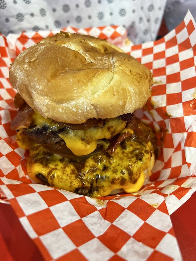 Double the pleasure, double the cheese! This burger isn't just a meal, it's a dare wrapped in a bun and smothered in melty goodness.