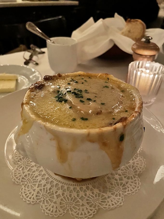 Forget the fountain of youth; we've found the cauldron of happiness! This French onion soup is so rich, it probably has its own offshore bank account.