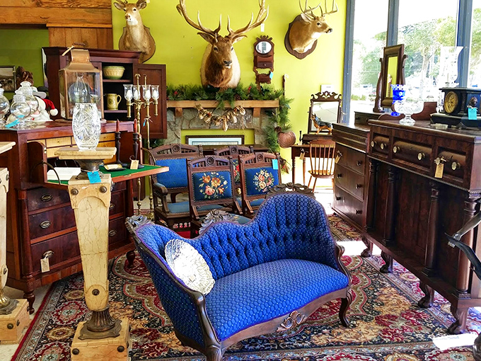 Cozy up in style! This blue settee looks ready for an impromptu tea party or a marathon viewing of "The Crown."