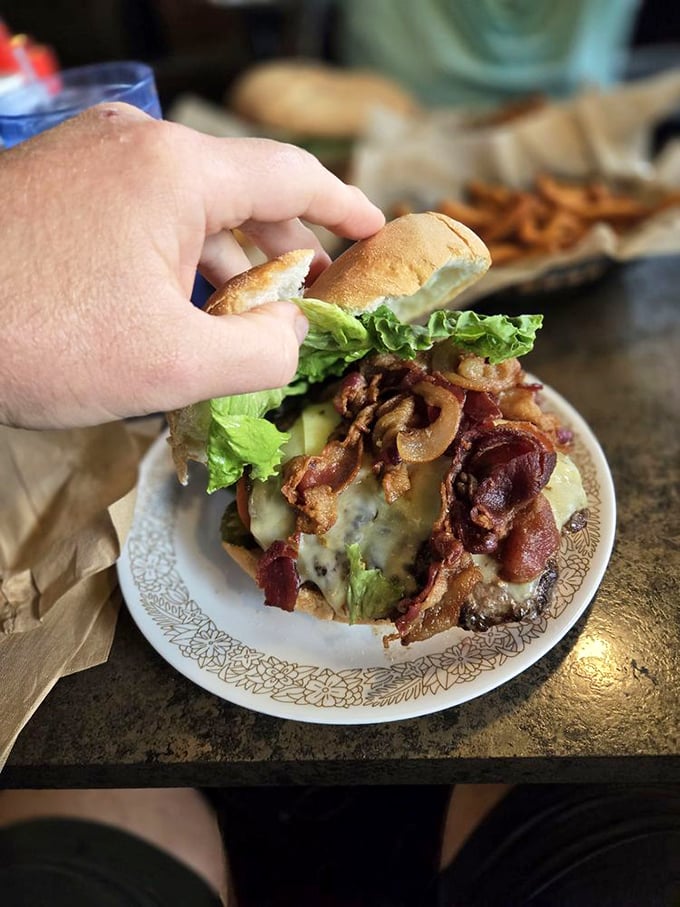 Size does matter when it comes to satisfaction. This behemoth burger is the Godzilla of the grill – in the best possible way.