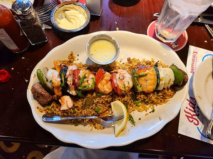 Grilled perfection on a plate! This seafood skewer is so colorful, it could double as edible Mardi Gras beads.