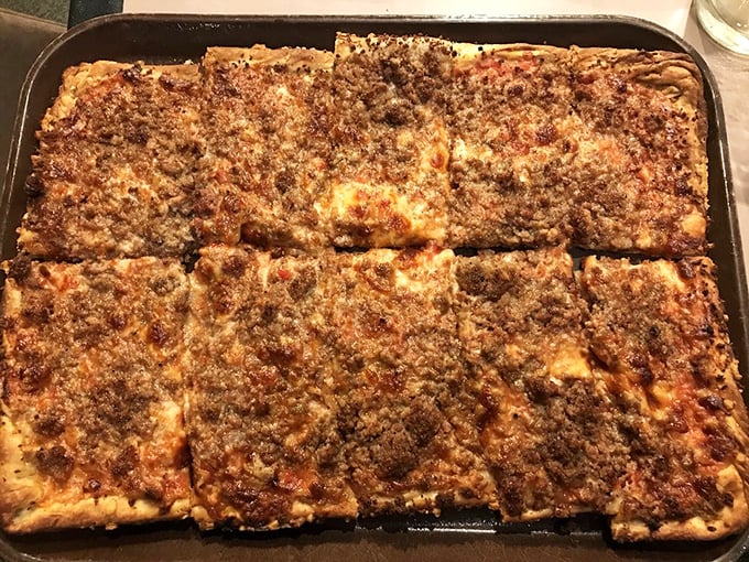 Meat lovers, rejoice! This hamburger pizza is what happens when a cheeseburger and a pizza have a delicious love child.