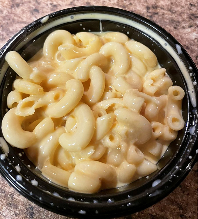 This isn't your dorm room mac and cheese. Each elbow pasta swimming in liquid gold would make King Midas jealous.