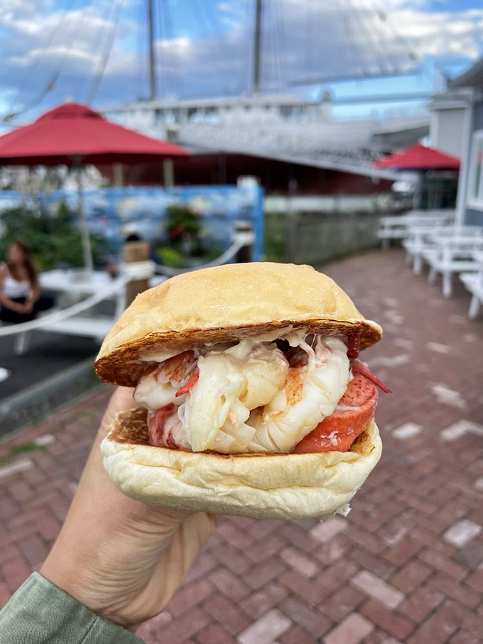 Behold, the lobster roll of your dreams! It's not just a sandwich; it's a work of art wrapped in a toasty bun.