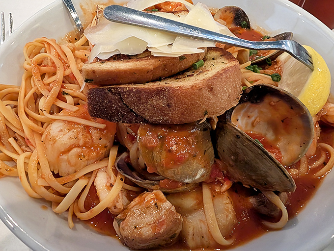 Pasta and seafood: a match made in heaven, or should I say, Poseidon's kitchen? This dish is like a delicious game of "I Spy" for your taste buds.