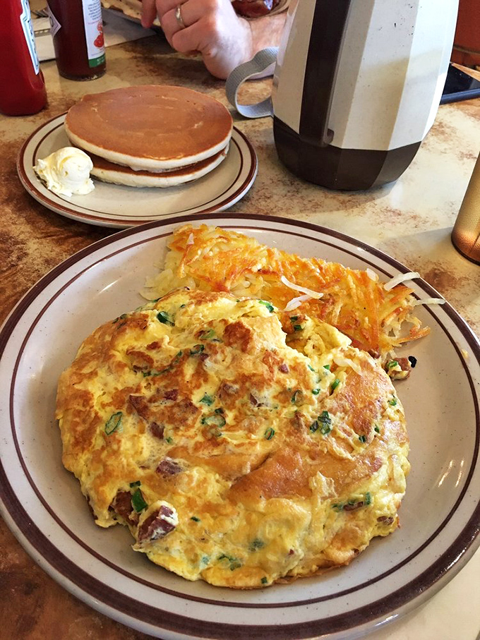 Portuguese sausage omelet: where Old World meets New in a harmonious blend of flavors. It's like a culinary luau in your mouth!