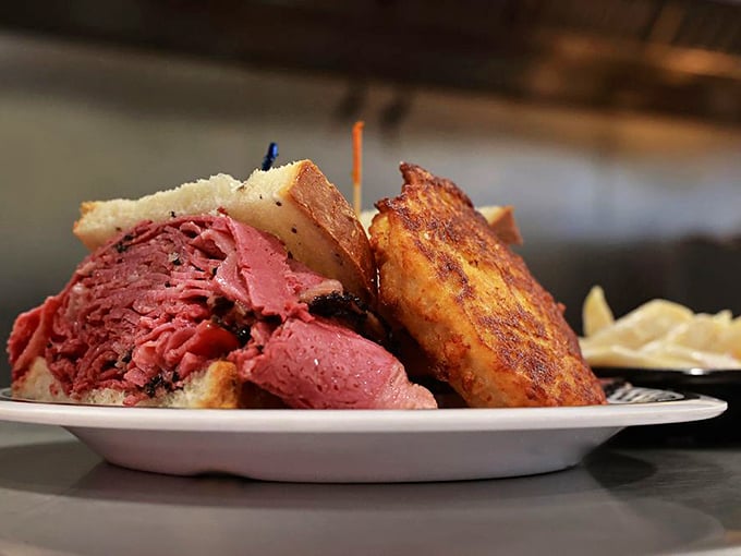 A sandwich so good, it comes with its own bodyguard! That pickle's not just for show, folks.