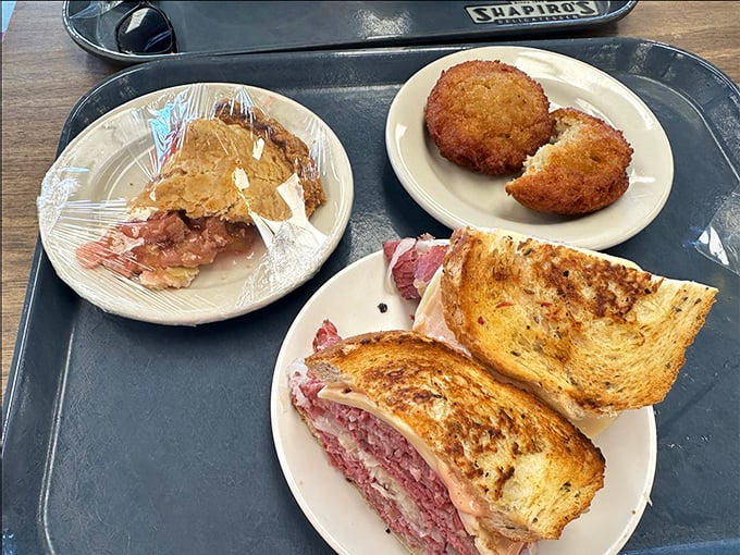 A feast fit for a king (or queen) of comfort food. The Reuben reigns supreme, flanked by loyal subjects of sides.