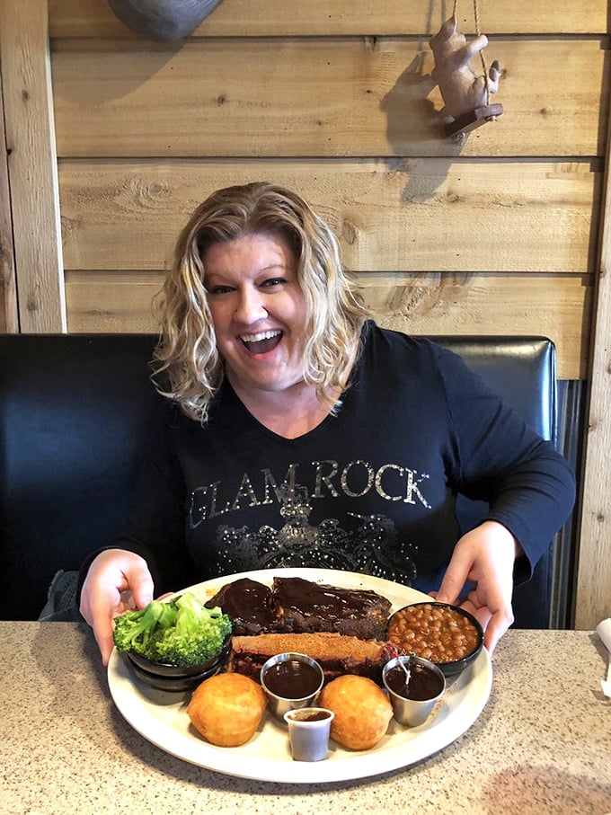 A plate that screams "food coma ahead!" Ribs and brisket join forces to create the Avengers of barbecue meals.