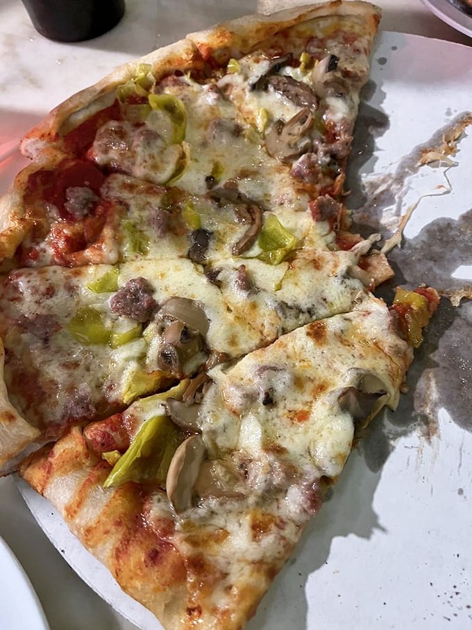 Mushroom and sausage unite in holy matrimony atop this pizza. It's a flavor fusion that'll make your taste buds say "I do!"