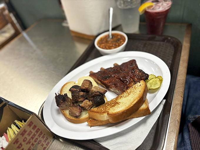The two-meat plate isn't indecision&mdash;it's strategic dining. Why choose between brisket and ribs when both are calling your name?