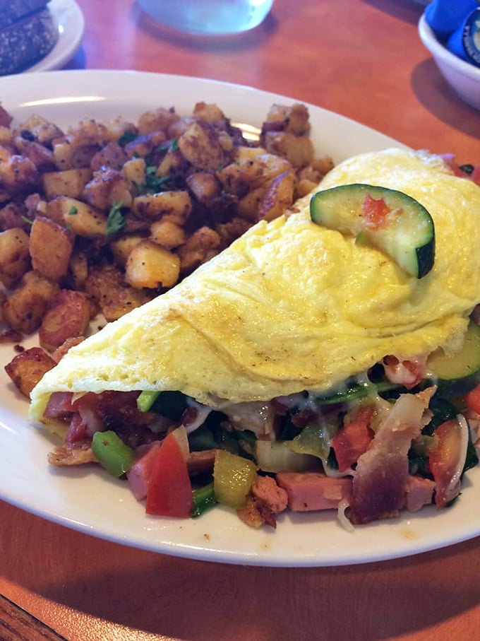 Garden party in an omelet! This veggie-packed wonder has more green than a millennial's smoothie collection.