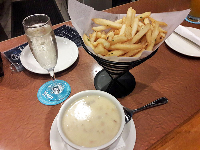 The dynamic duo of comfort food: clam chowder and fries. It's like a warm hug for your taste buds.