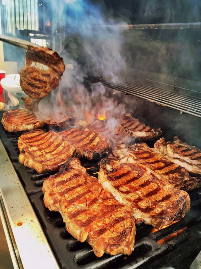 These ribeyes sizzling over open flame remind us that sometimes the simplest cooking methods yield the most profound pleasures.
