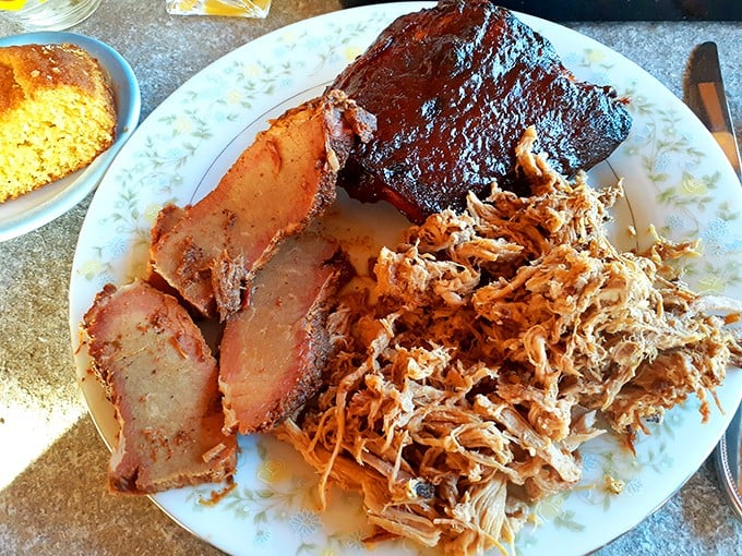 BBQ heaven on a plate! This spread is more colorful than a Bob Ross painting and twice as satisfying. Finger-lickin' good doesn't even begin to cover it.