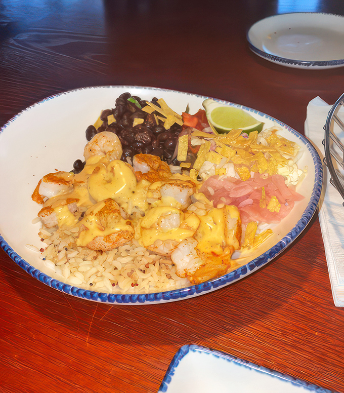 A fiesta in a bowl! This Baja Shrimp creation is like a spring break for your taste buds, minus the regrettable decisions.