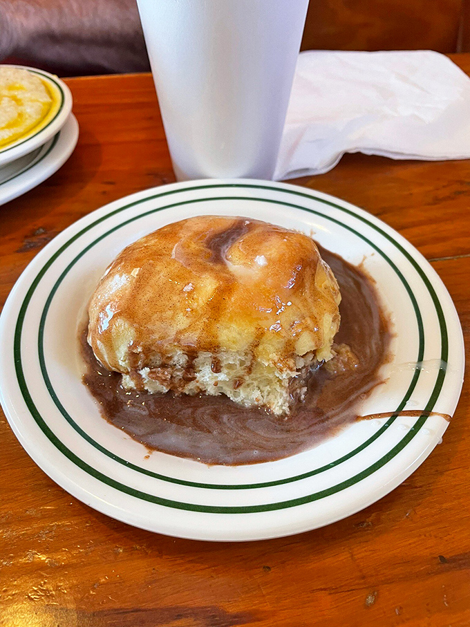 Behold the biscuit in all its glory, basking in a pool of velvety gravy. It's like a spa day for your taste buds!