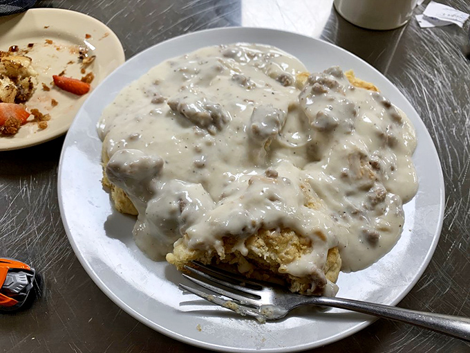 Sausage gravy on biscuits: It's like a warm, peppery blanket for your soul. Comfort food? More like comfort feast!