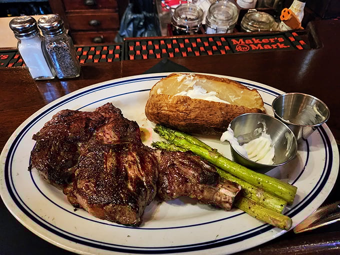 This bone-in ribeye is so perfectly charred, it could make a vegetarian weep. It's not just a steak; it's a work of art with grill marks.