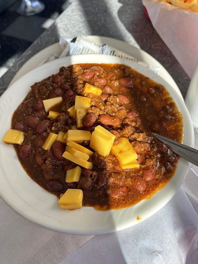 Warm, hearty, and packed with flavor – this chili's like a hug for your taste buds. Bonus: it doubles as a hand warmer!