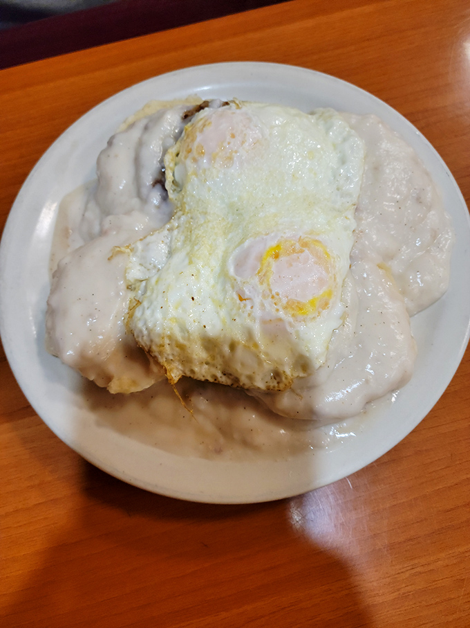 Biscuits that could make a Southerner weep with joy, smothered in gravy thick enough to stand a spoon in. Breakfast perfection!