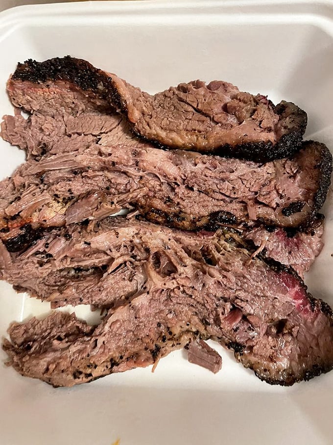 Brisket so tender, it practically melts on the plate. It's the Rolls-Royce of beef, smoky and succulent.