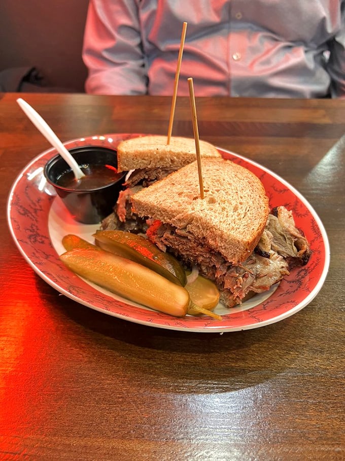Brisket on rye: a match made in heaven! This sandwich is so packed, it's practically bursting with meaty goodness.