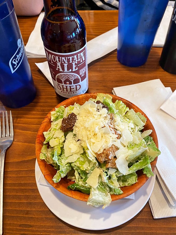 A Caesar salad that's more than just a sidekick. Crisp romaine, parmesan shavings, and croutons team up for a refreshing counterpoint to smoky BBQ.