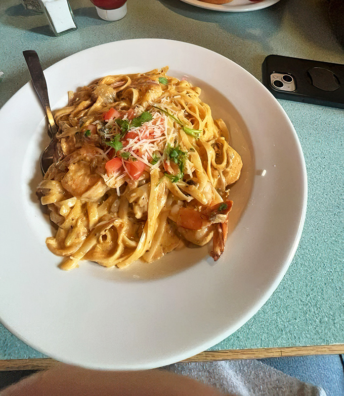 The Cajun Alfredo doesn't just flirt with your taste buds&mdash;it proposes marriage with plump shrimp nestled in creamy pasta that's worth every calorie.